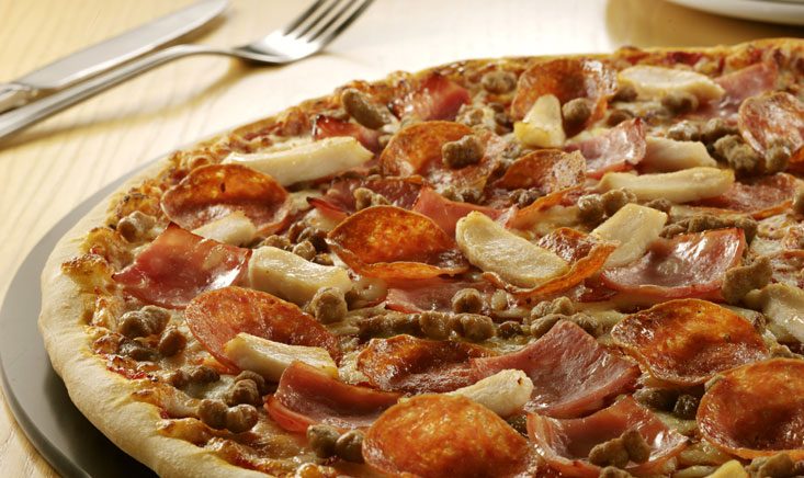 Making the Ultimate Meat Feast Pizza – Man Wants